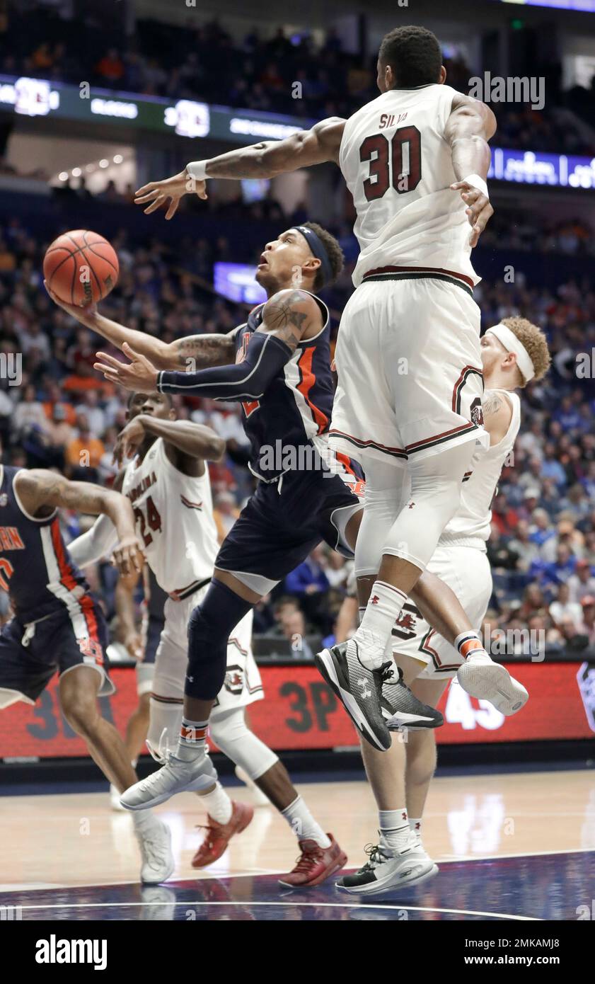 Auburn guard Bryce Brown (2) drives past South Carolina forward Chris ...