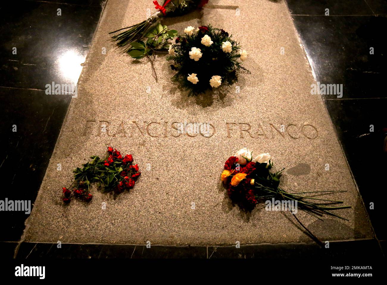 FILE - In this Friday, Aug. 24, 2018 file photo, flowers are placed on ...