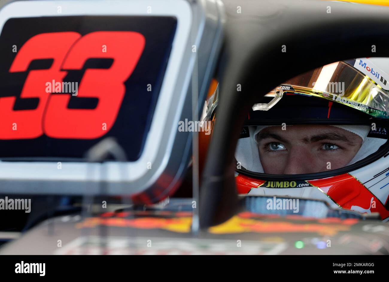 Red Bull driver Max Verstappen of the Netherlands sits in his car ...