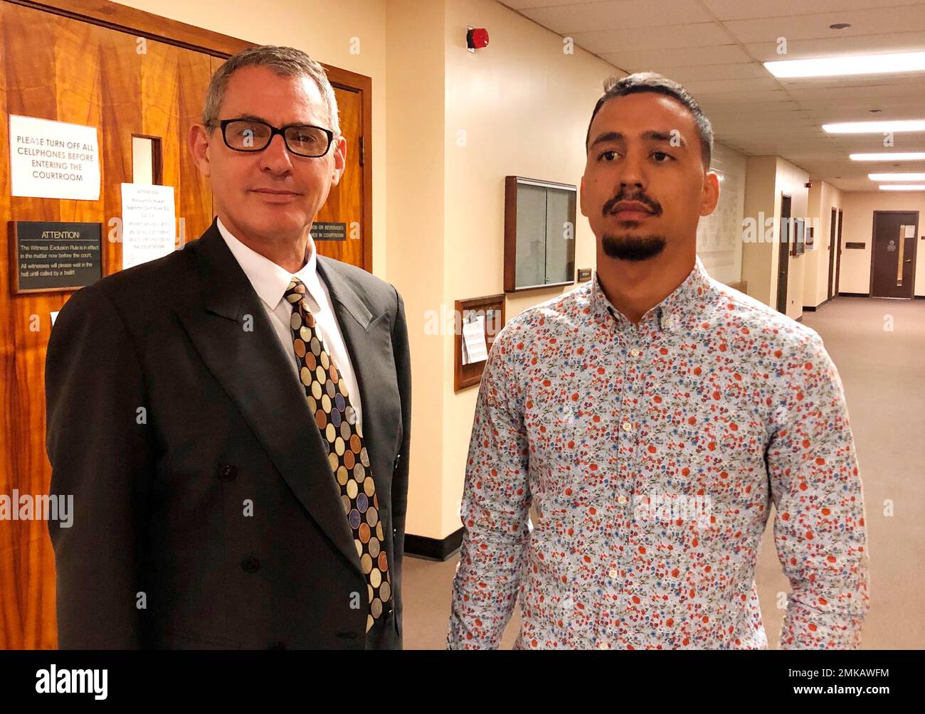 Mixed martial arts fighter Arnold Berdon, right, and his attorney Myles ...