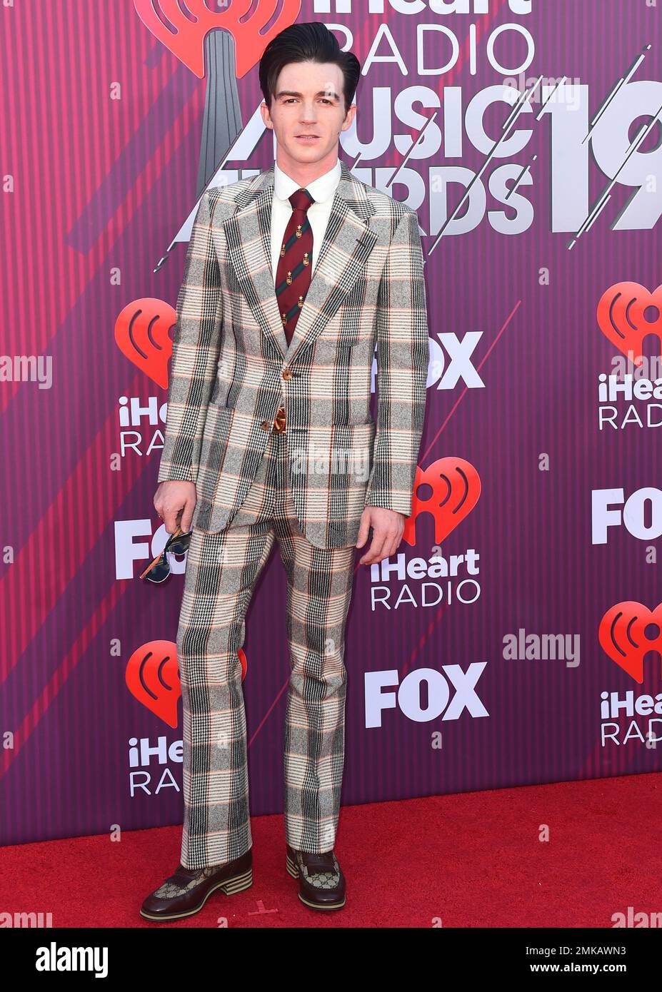 Drake Bell arrives at the iHeartRadio Music Awards on Thursday, March ...