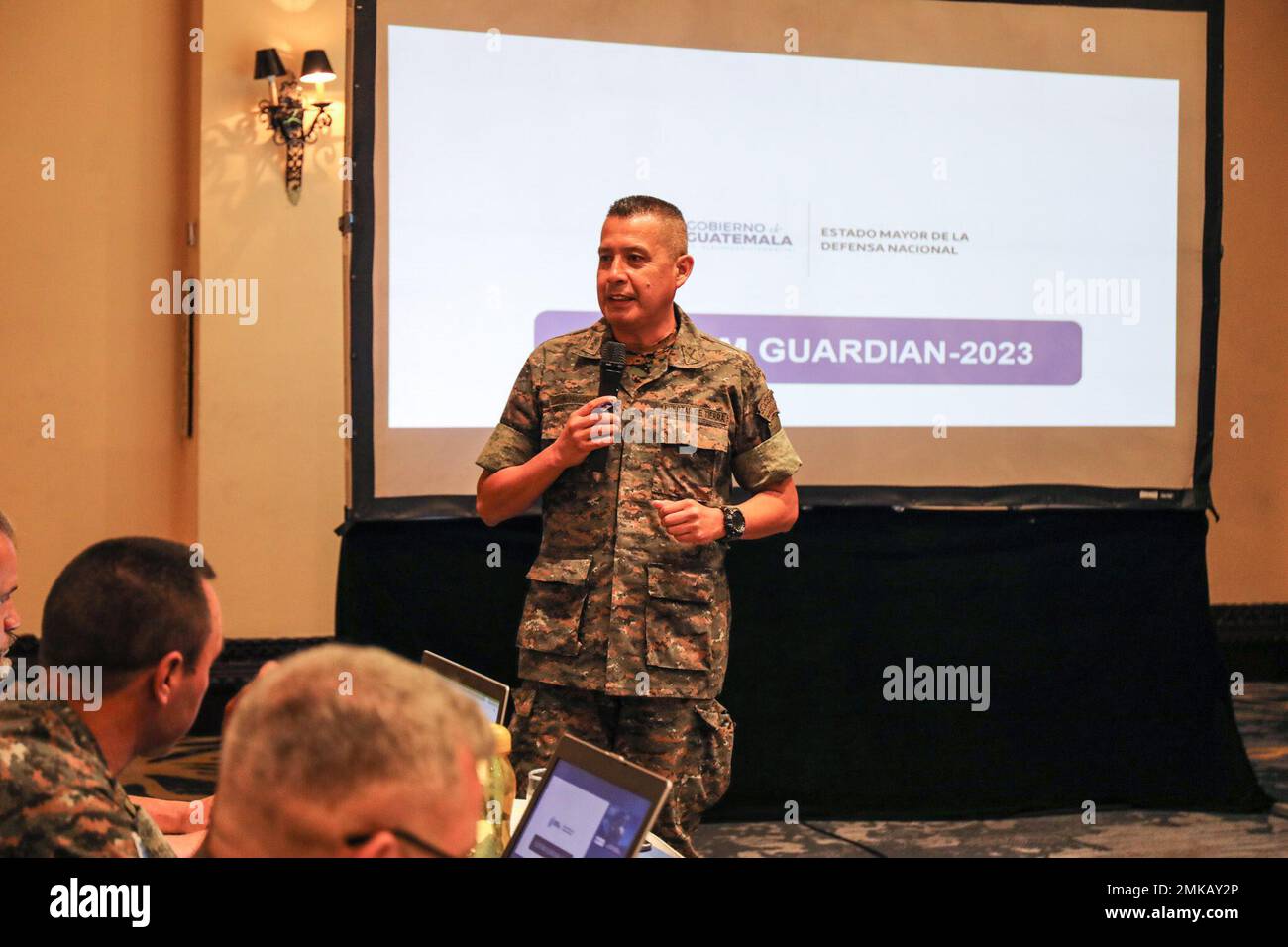 A member of the Guatemalan army delegation gives a presentation during ...