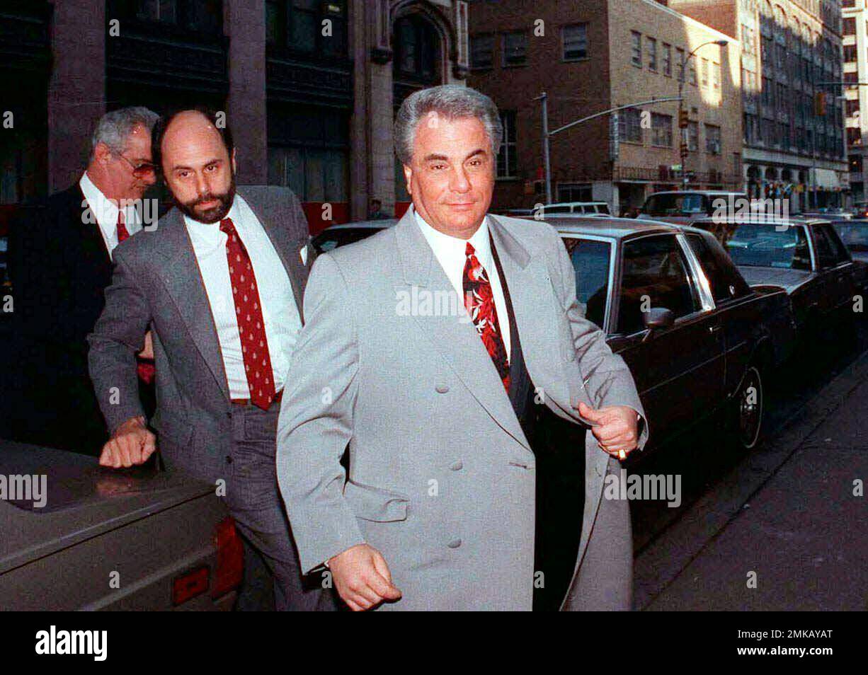 FILE - In this Feb. 9, 1990 file photo, John Gotti, right, arrives at ...