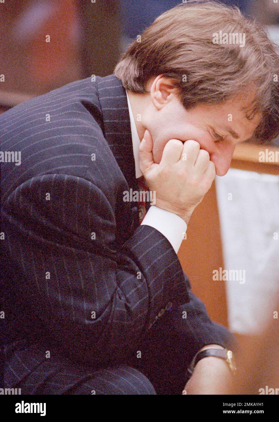 Barry Scheck, DNA expert for the defense, holds his head during the O.J ...