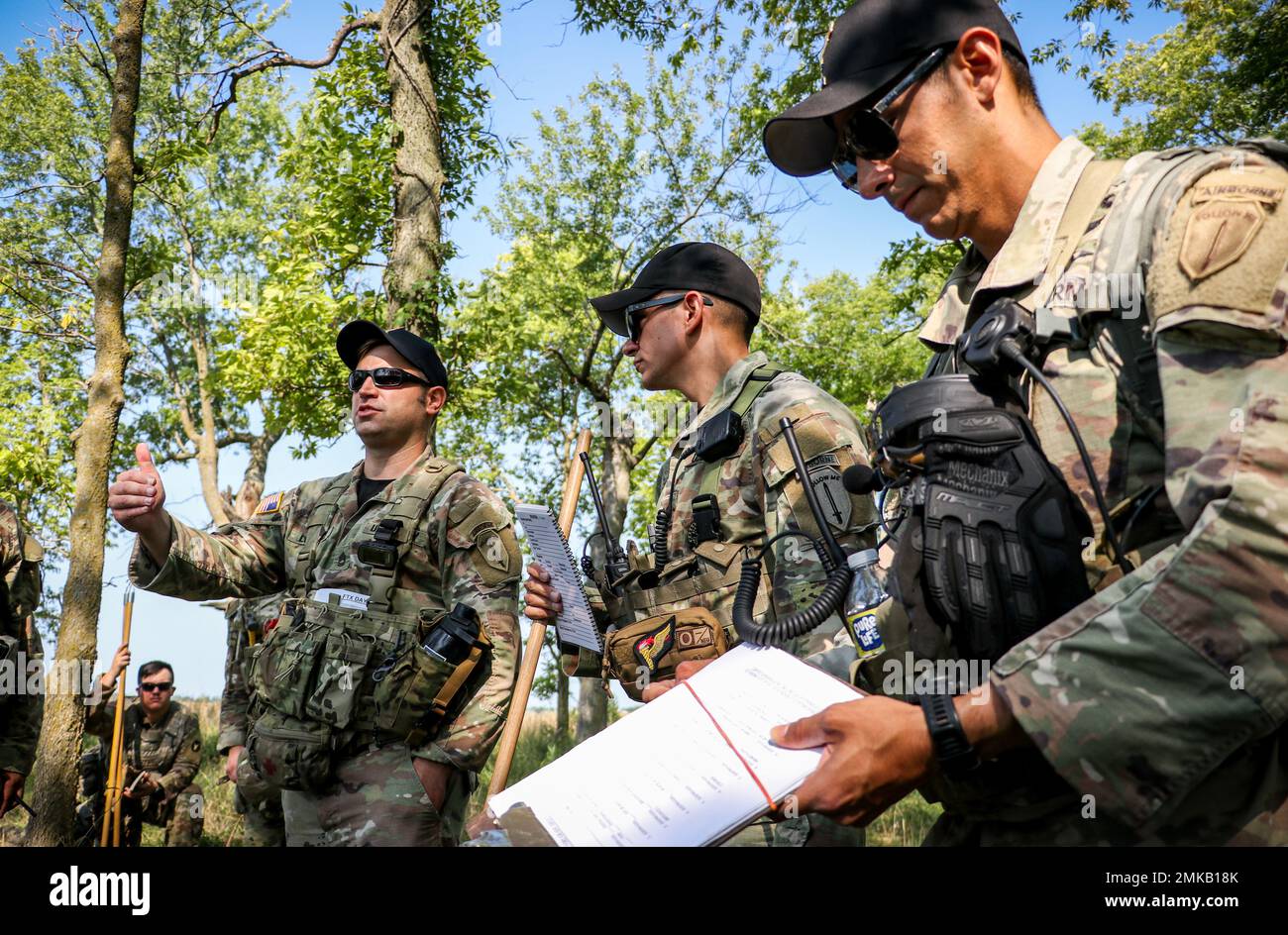U.S. Army Pathfinder instructors give directions to students during an ...
