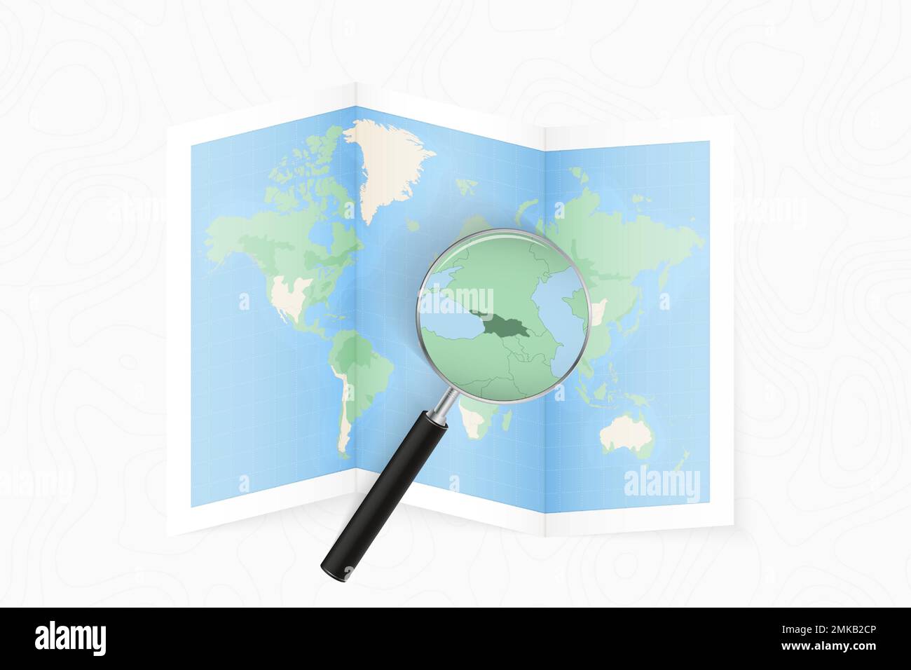 Enlarge Georgia with a magnifying glass on a folded map of the world ...