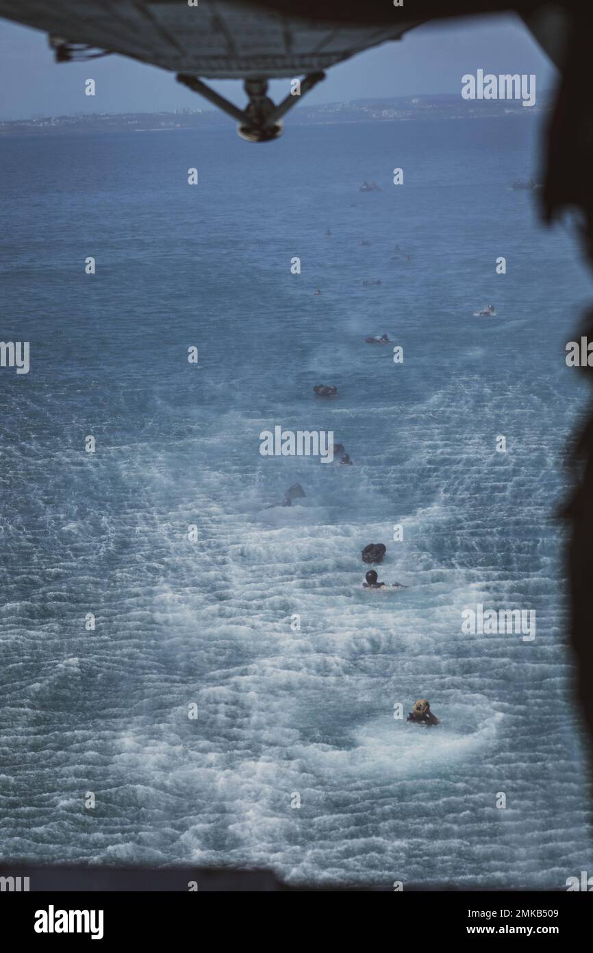 U.S. Marines with III Marine Expeditionary Force (MEF), swim after ...