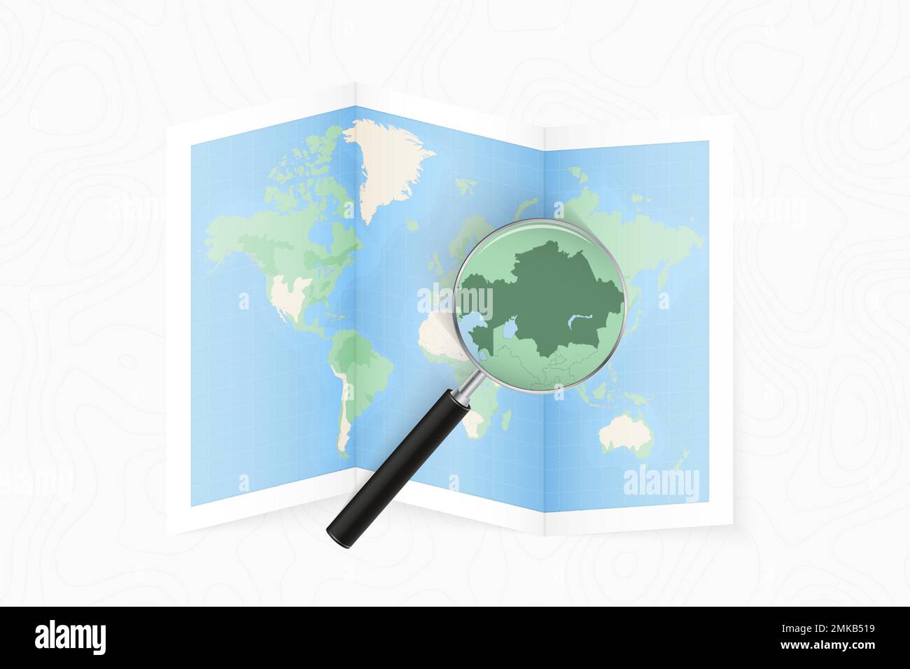 Enlarge Kazakhstan with a magnifying glass on a folded map of the world ...