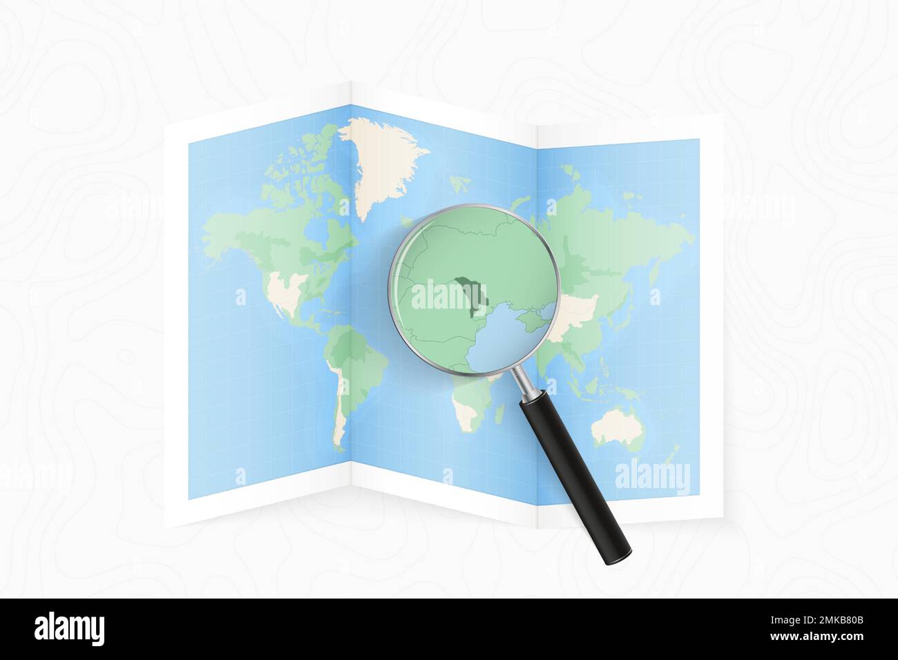Enlarge Moldova with a magnifying glass on a folded map of the world ...
