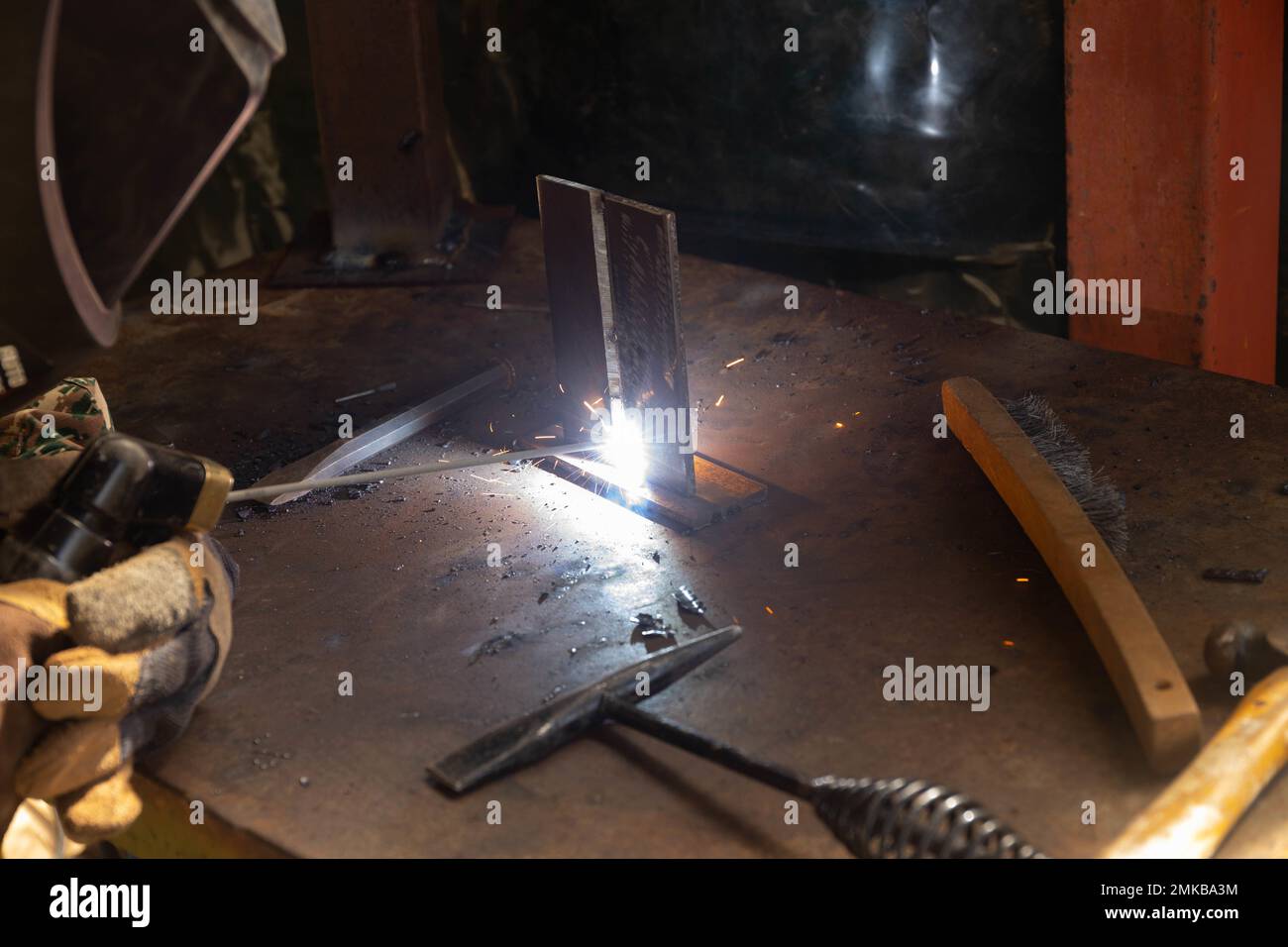 A Timor-Leste Defense Force soldier performs a vertical weld during a ...