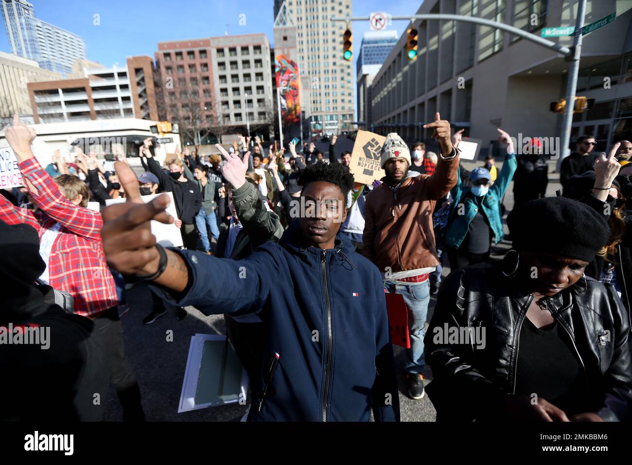 Raleigh, North Carolina, USA. 28th Jan, 2023. Protesters raise their ...