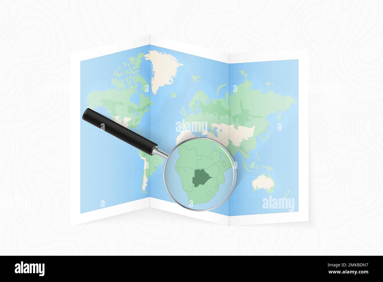 Enlarge Botswana with a magnifying glass on a folded map of the world ...