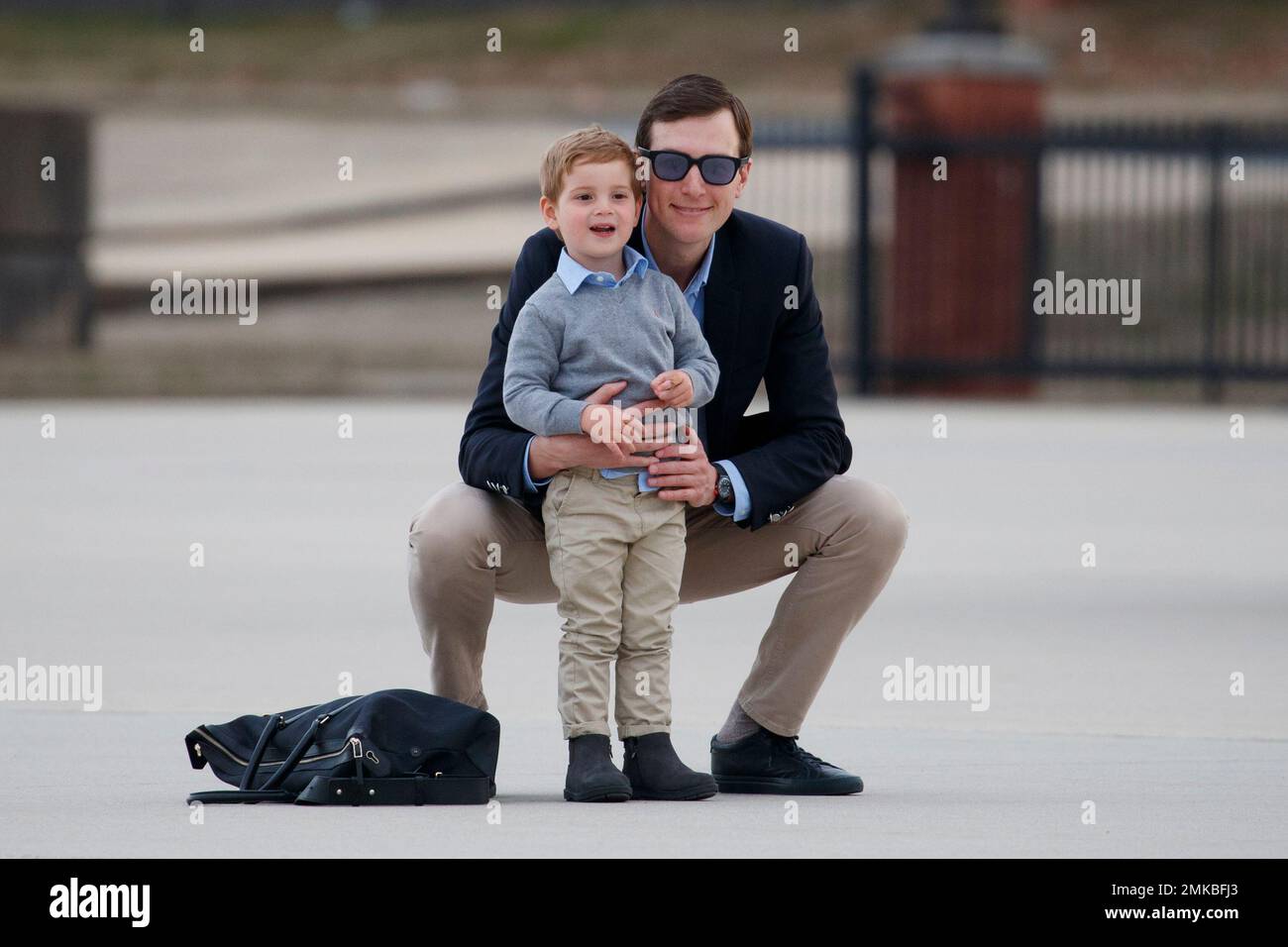 White House senior adviser Jared Kushner holds his son Theodore Kushner ...