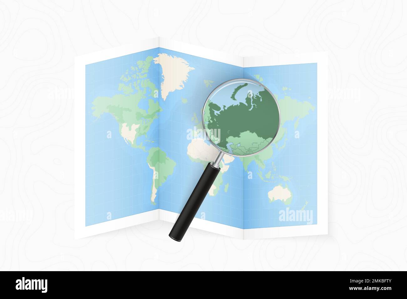 Enlarge Russia with a magnifying glass on a folded map of the world ...