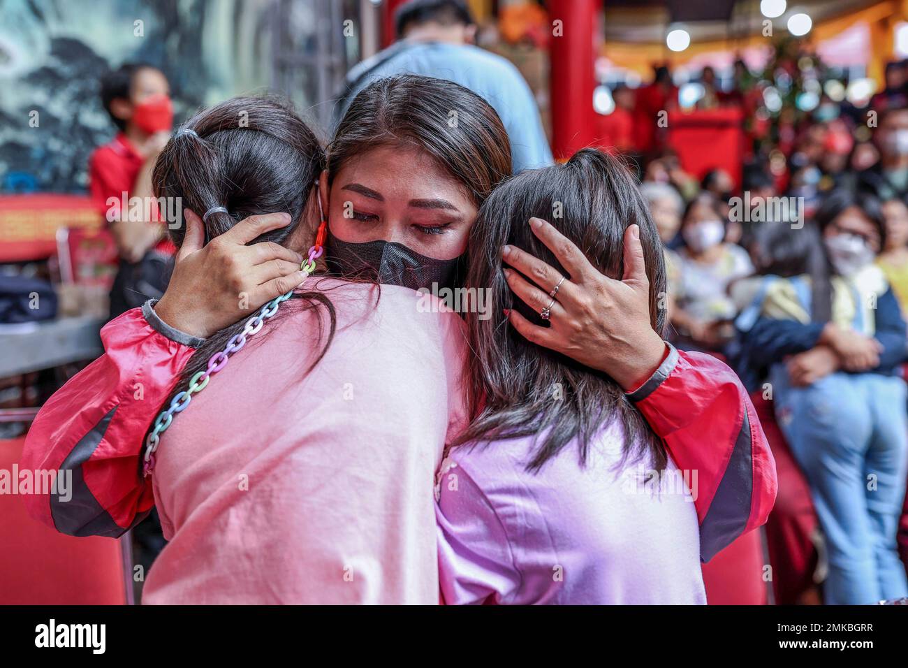 Bogor, Indonesia. 28th Jan, 2023. A woman hugs and kisses her child ...
