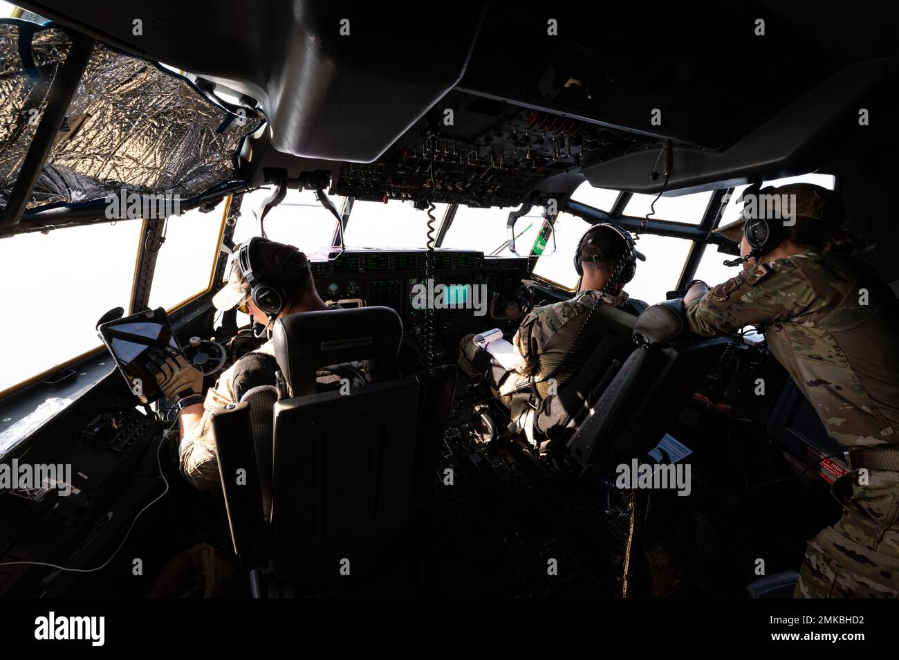 A U.S. Air Force HC-130J Combat King II pilot, copilot and navigator ...