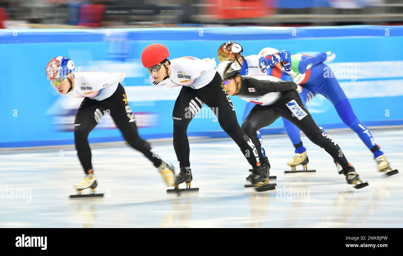 South Korea's Hyo Jun Lim competes followed by Dae Heon Hwang and Japan ...