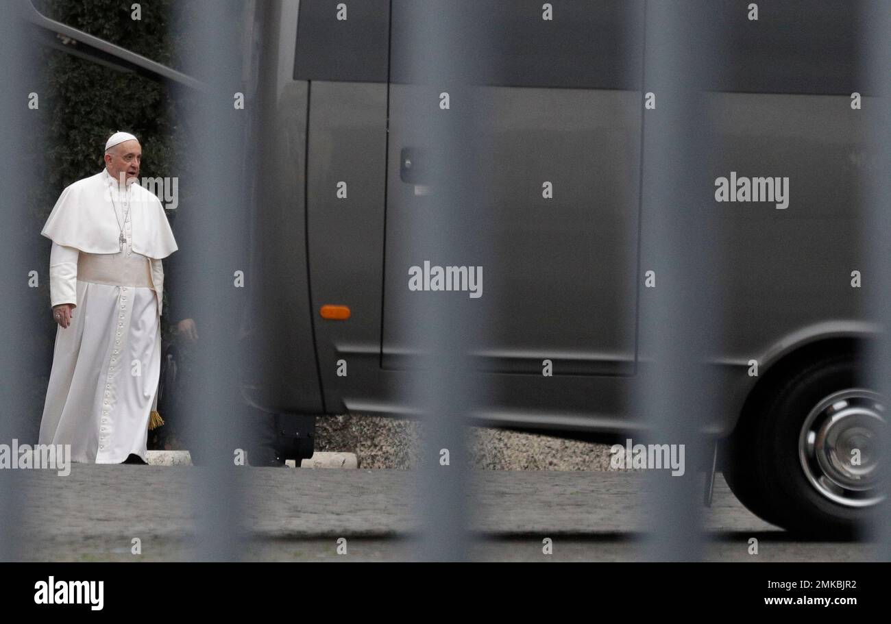 Pope Francis arrives to board a bus as he leaves for a week of ...