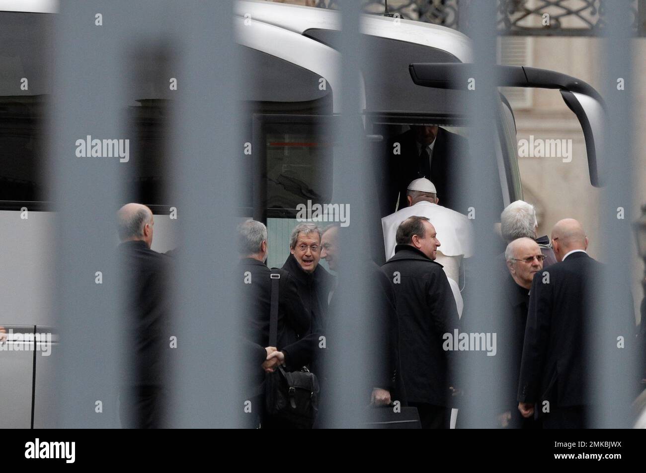 Pope Francis boardS a bus as he leaves for a week of spiritual ...