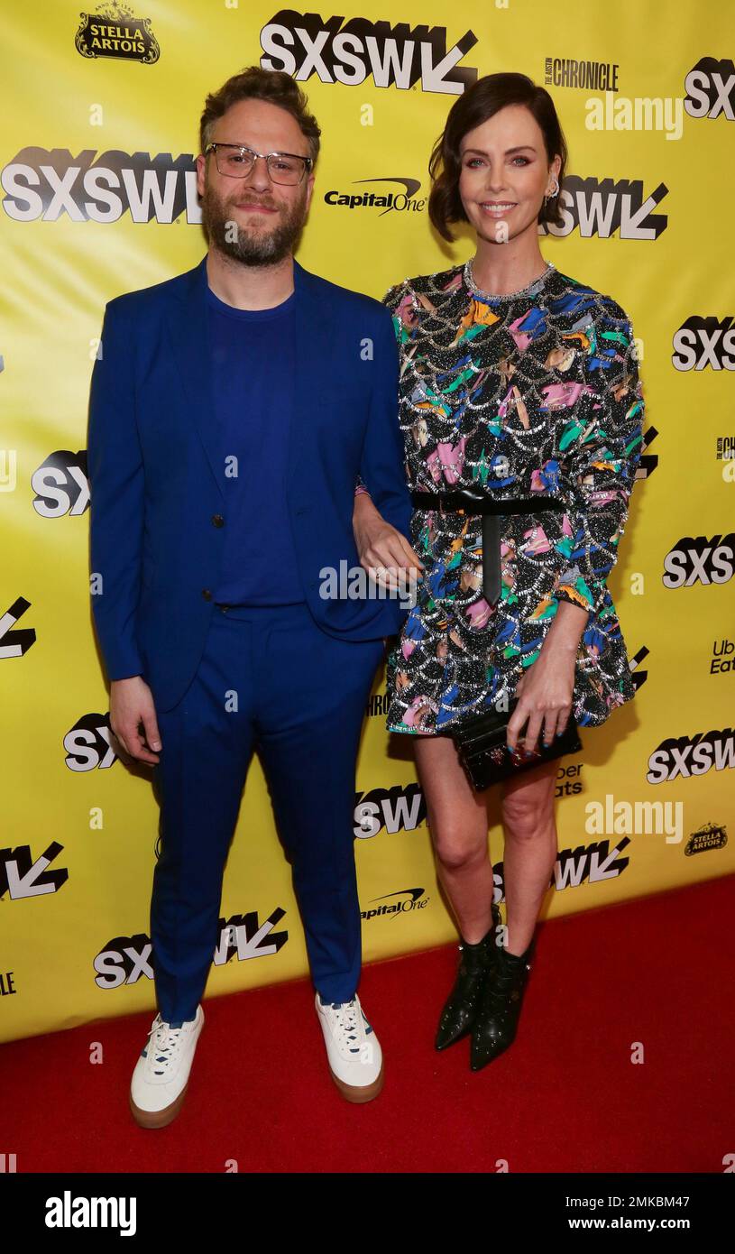Seth Rogen, left, and Charlize Theron arrive for the world premiere of ...