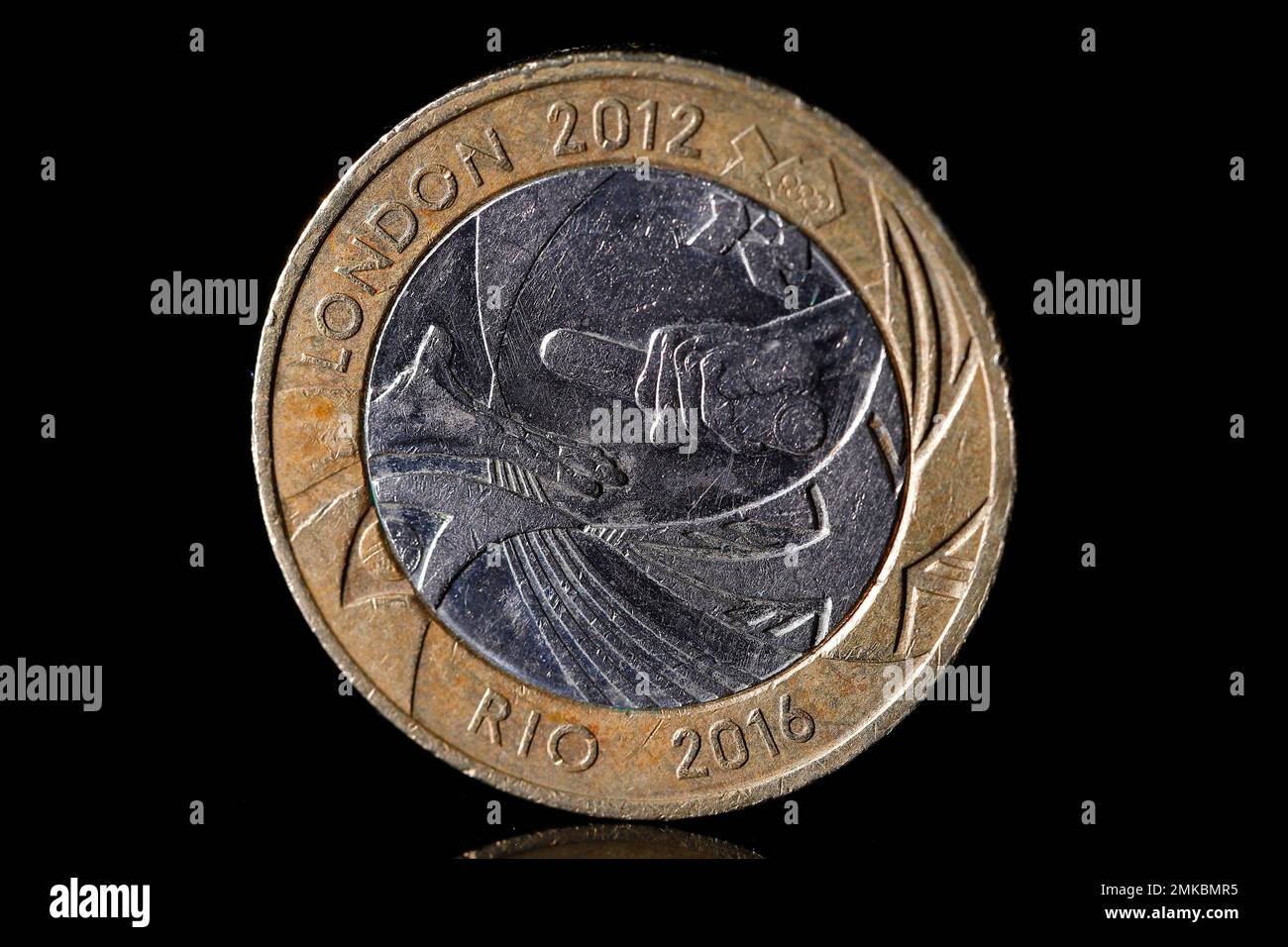 A UK £2 coin issued by the Royal Mint to commemorate the handover of th ...