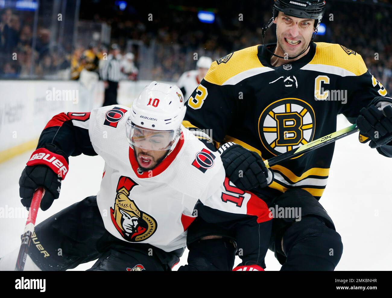 Ottawa Senators' Anthony Duclair (10) and Boston Bruins' Zdeno Chara ...