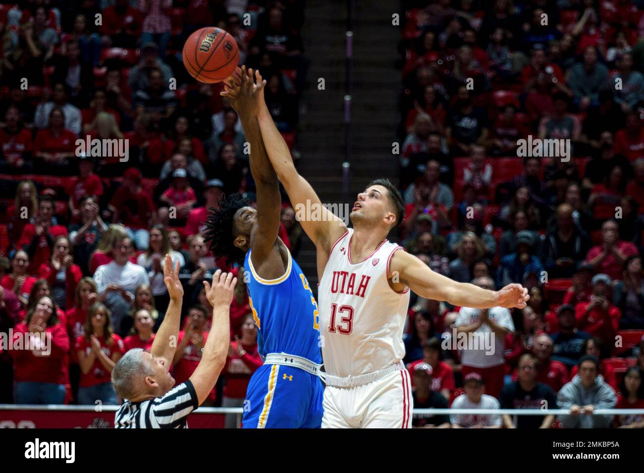 UCLA guard Jalen Hill, center, and Utah forward Novak Topalovic (13 ...