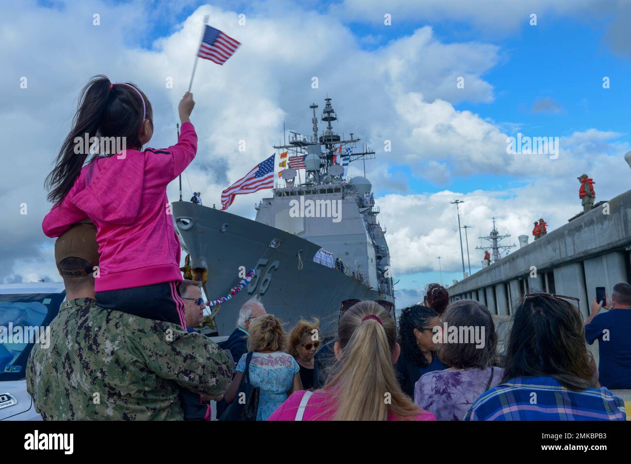 NORFOLK (Sept. 8, 2022) Family and friends of Sailors aboard the USS ...
