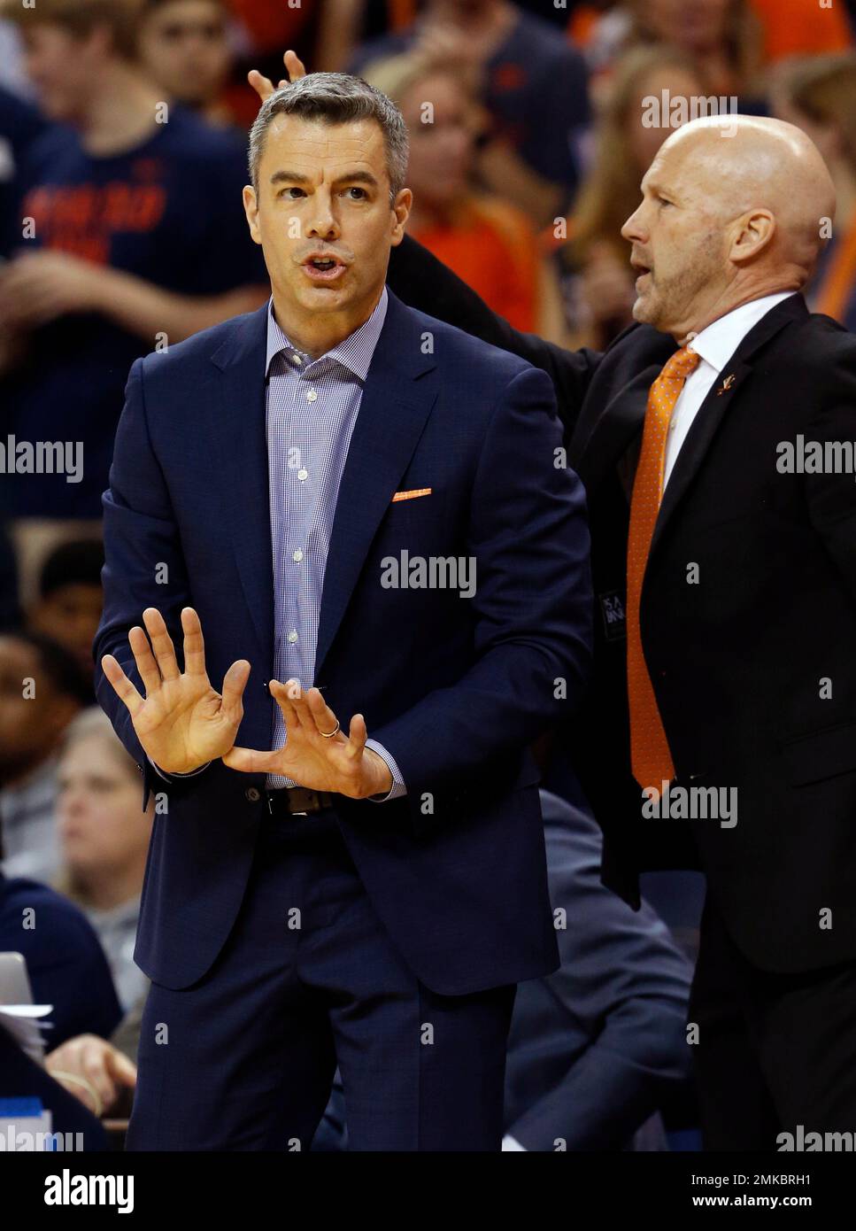 Virginia head coach Tony Bennett, left, directs his team during the ...