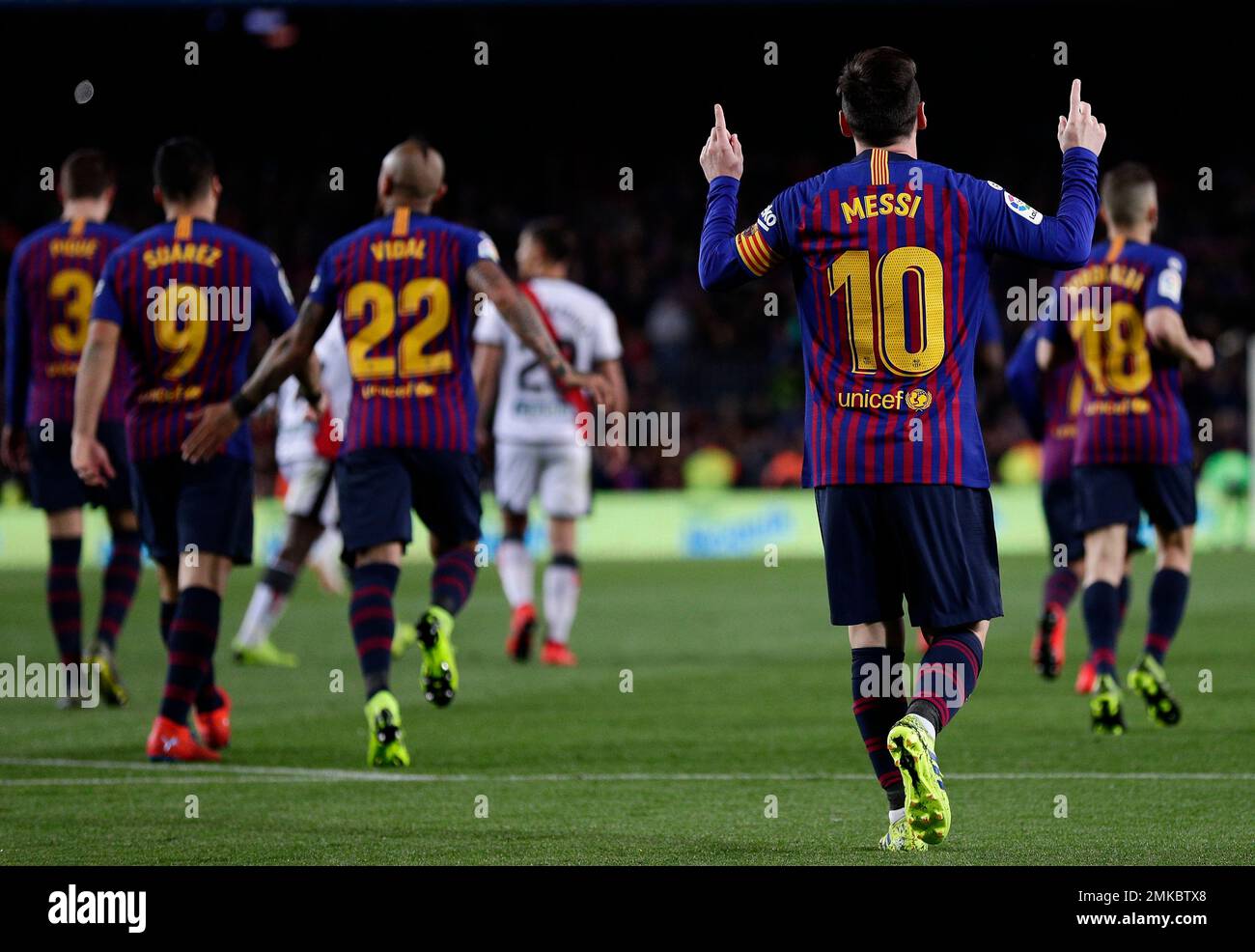 FC Barcelona's Lionel Messi, right, celebrates after scoring his side's ...