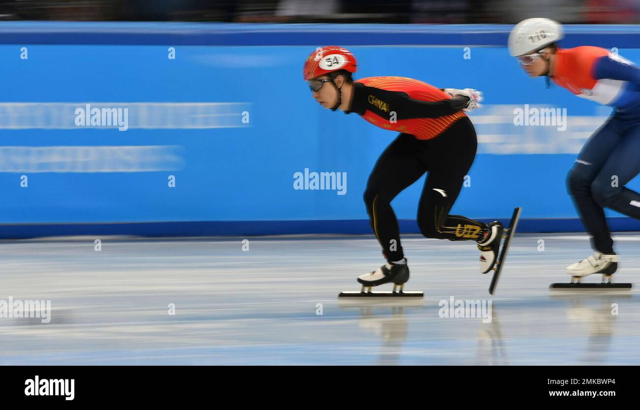Dajing Wu of China competes in the men's 1500m ranking finals, followed ...
