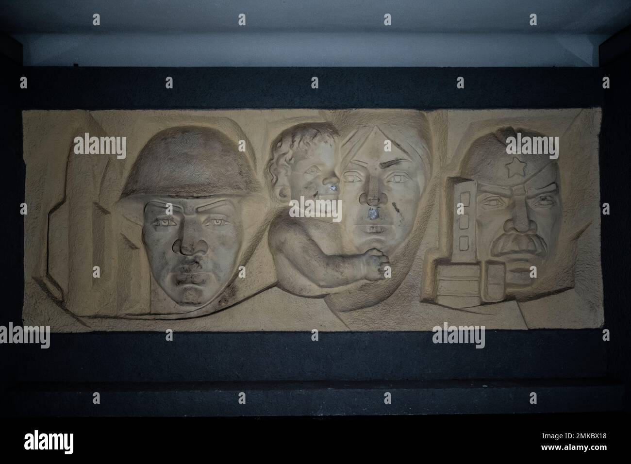 This Tuesday, Feb. 22, 2019, photo shows wall relief with Lenin, right ...