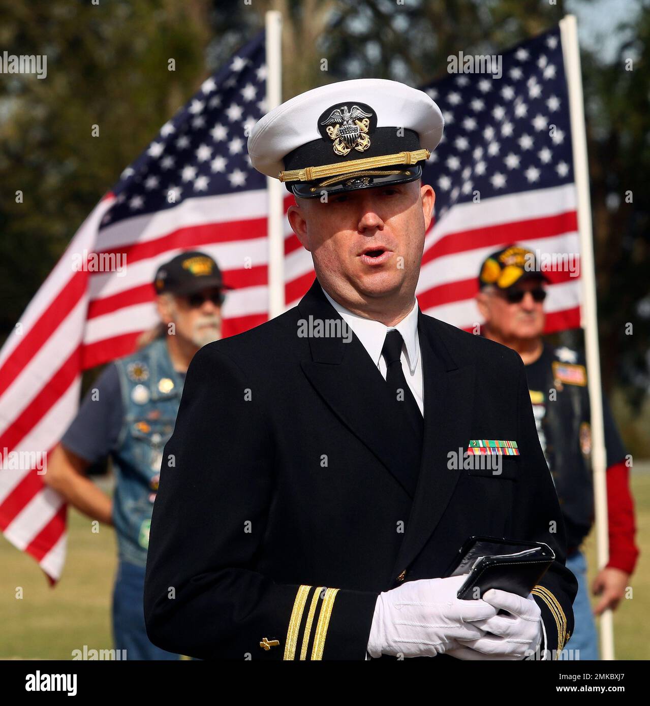 Lt. Cmdr. Jonathan Craig, chaplain, U.S. Navy Reserve, gives the eulogy ...