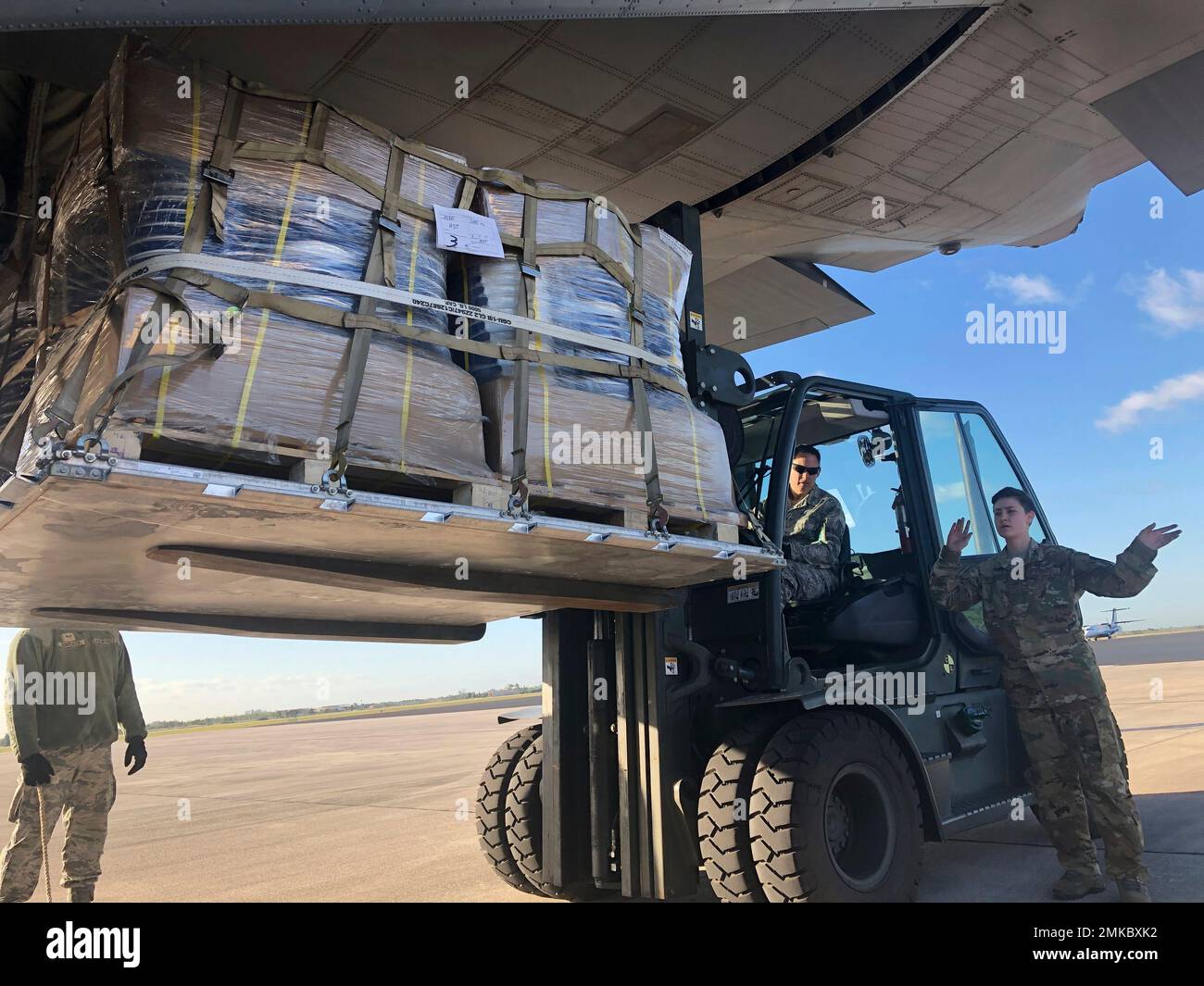 In this March 7, 2019 photo, military personnel load seven pallets with ...