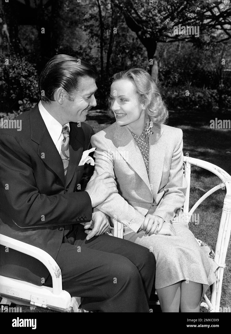 Film stars Clark Gable and Carole Lombard are pictured at the home of ...