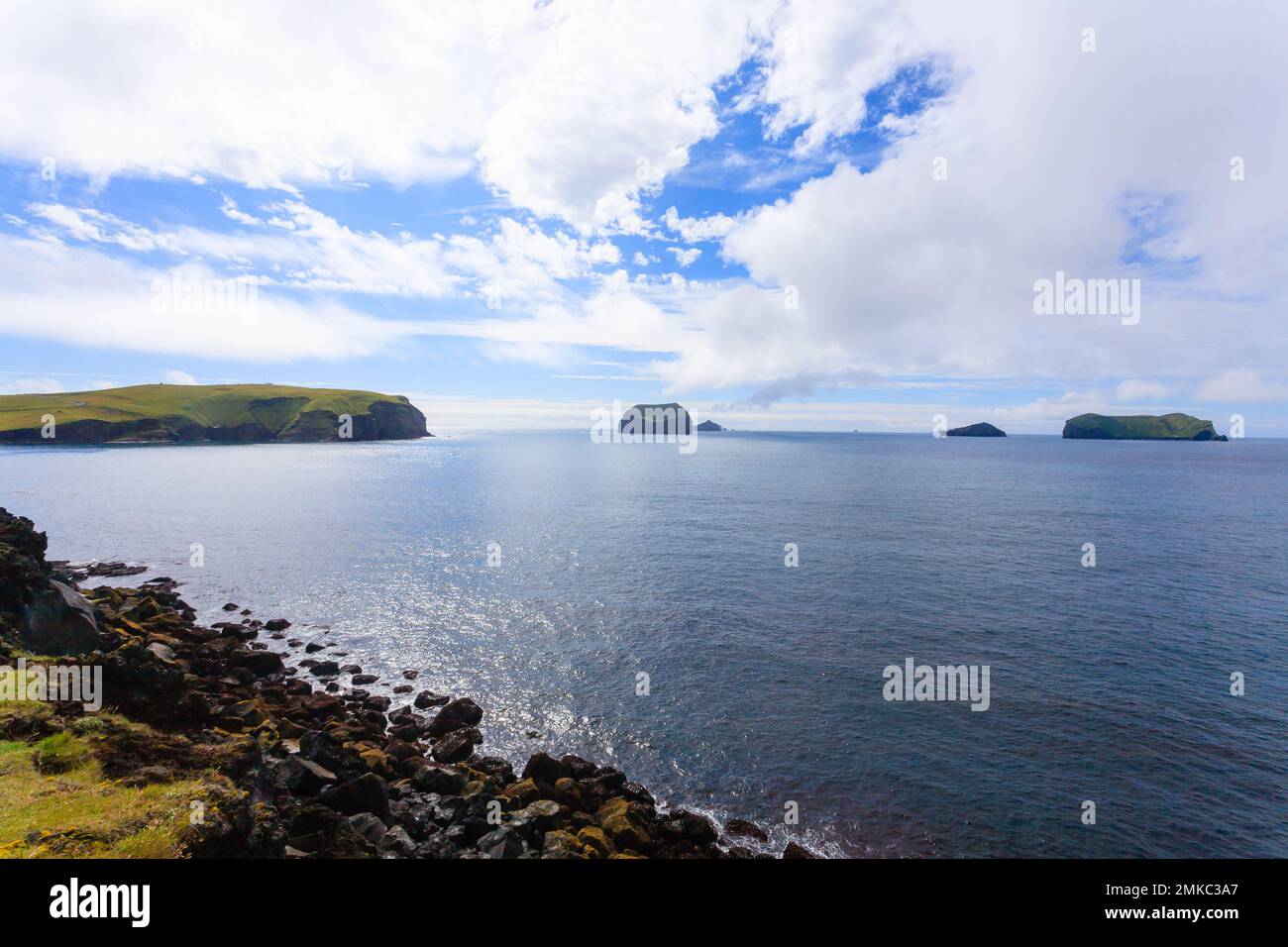 Vestmannaeyjar island beach view with Surtsey island in background ...