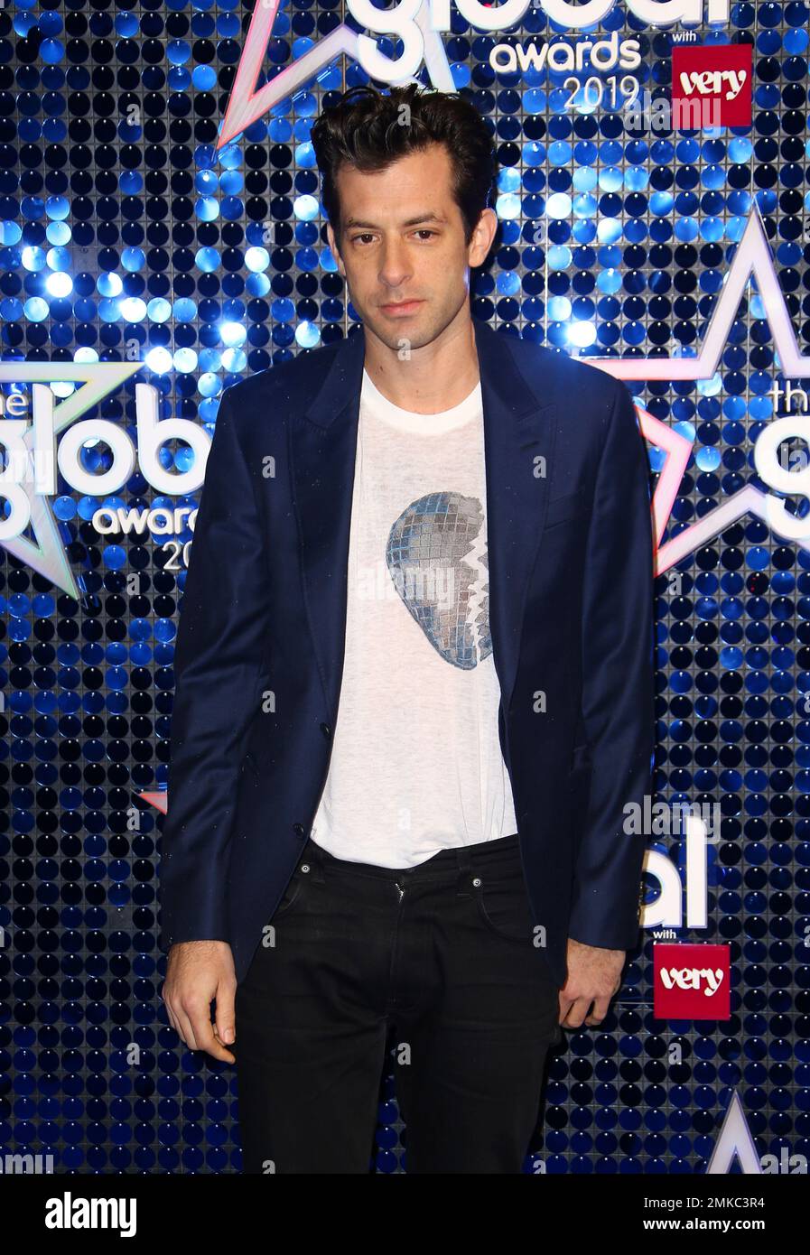Mark Ronson poses for photographers upon arrival at the Global Gift ...