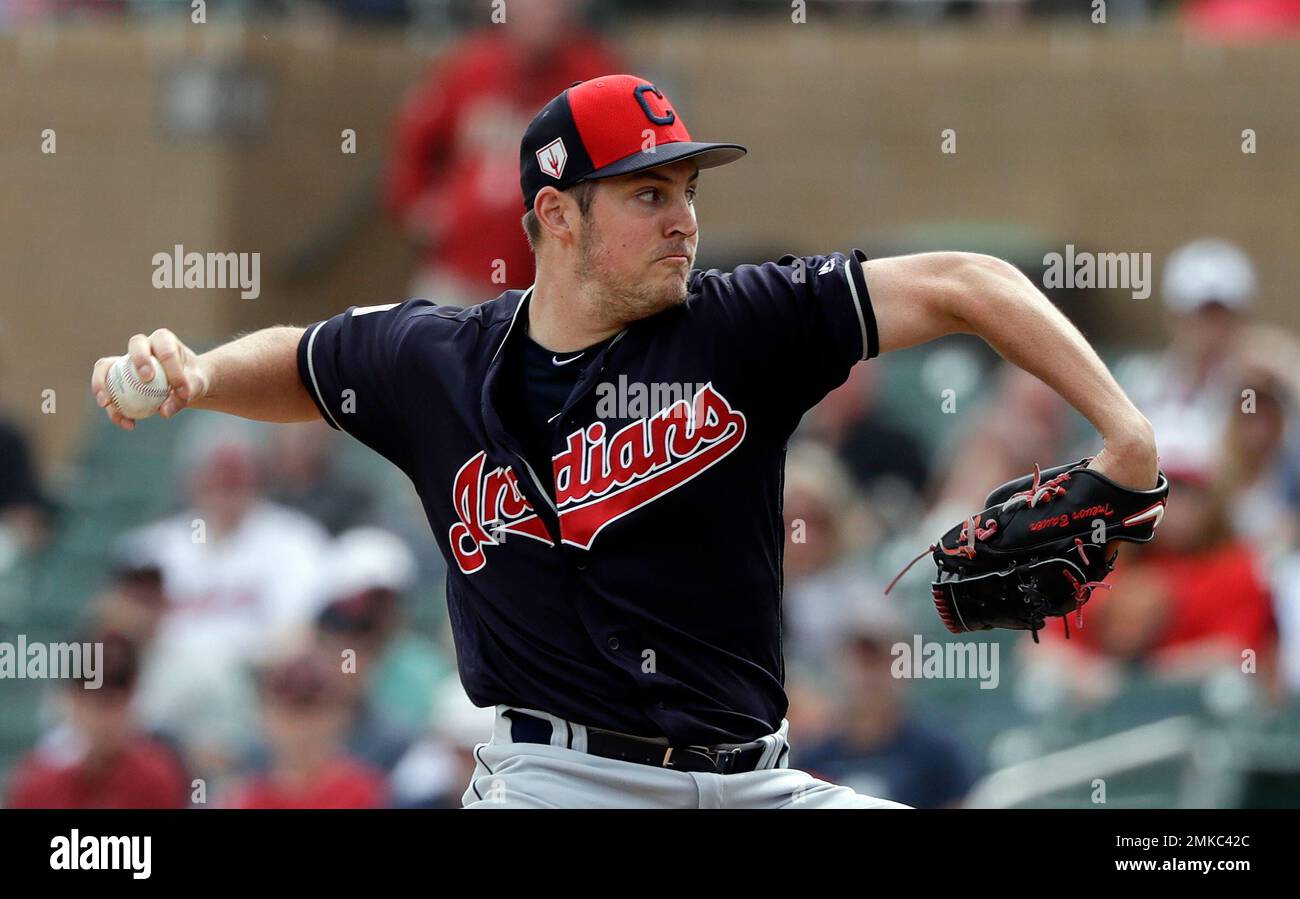 Cleveland Indians starting pitcher Trevor Bauer throws against the ...