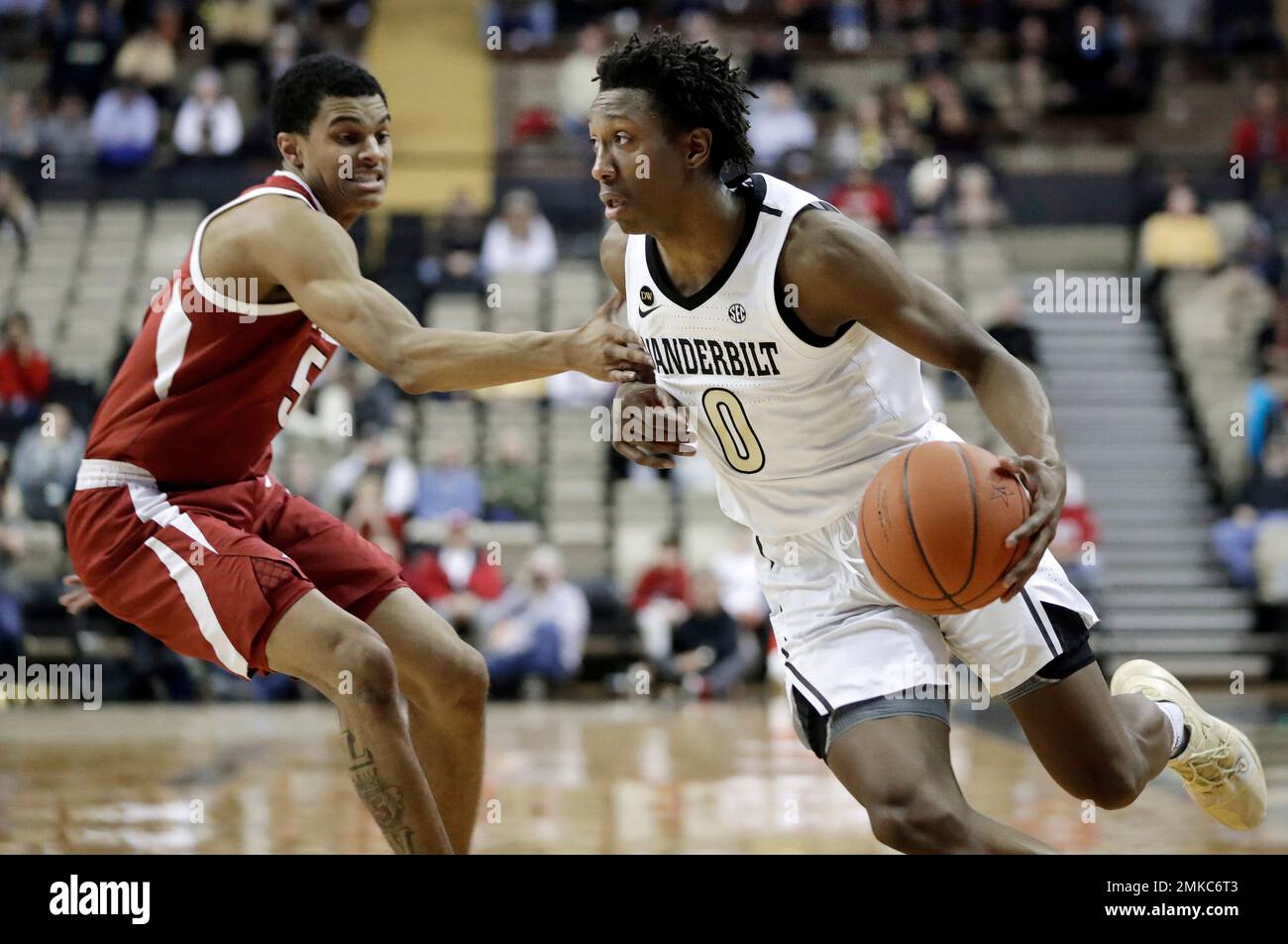 Vanderbilt guard Saben Lee (0) drives against Arkansas guard Jalen ...