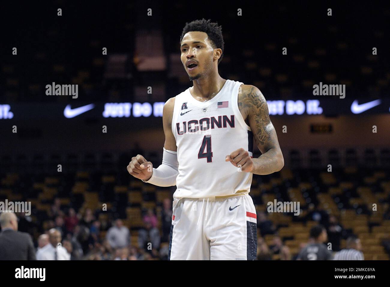Connecticut guard Jalen Adams (4) reacts after a play during the second ...