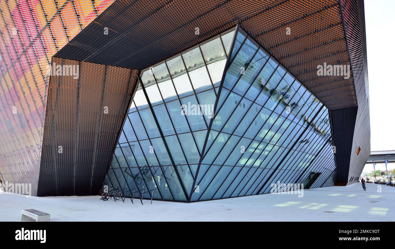 Abstract closeup of the glass-clad facade of a modern building covered ...