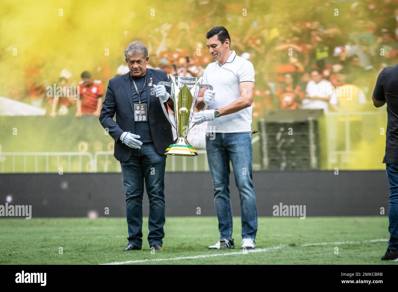BRASÍLIA, DF - JANUARY 28: Former Player Lucio carries the trophy ...