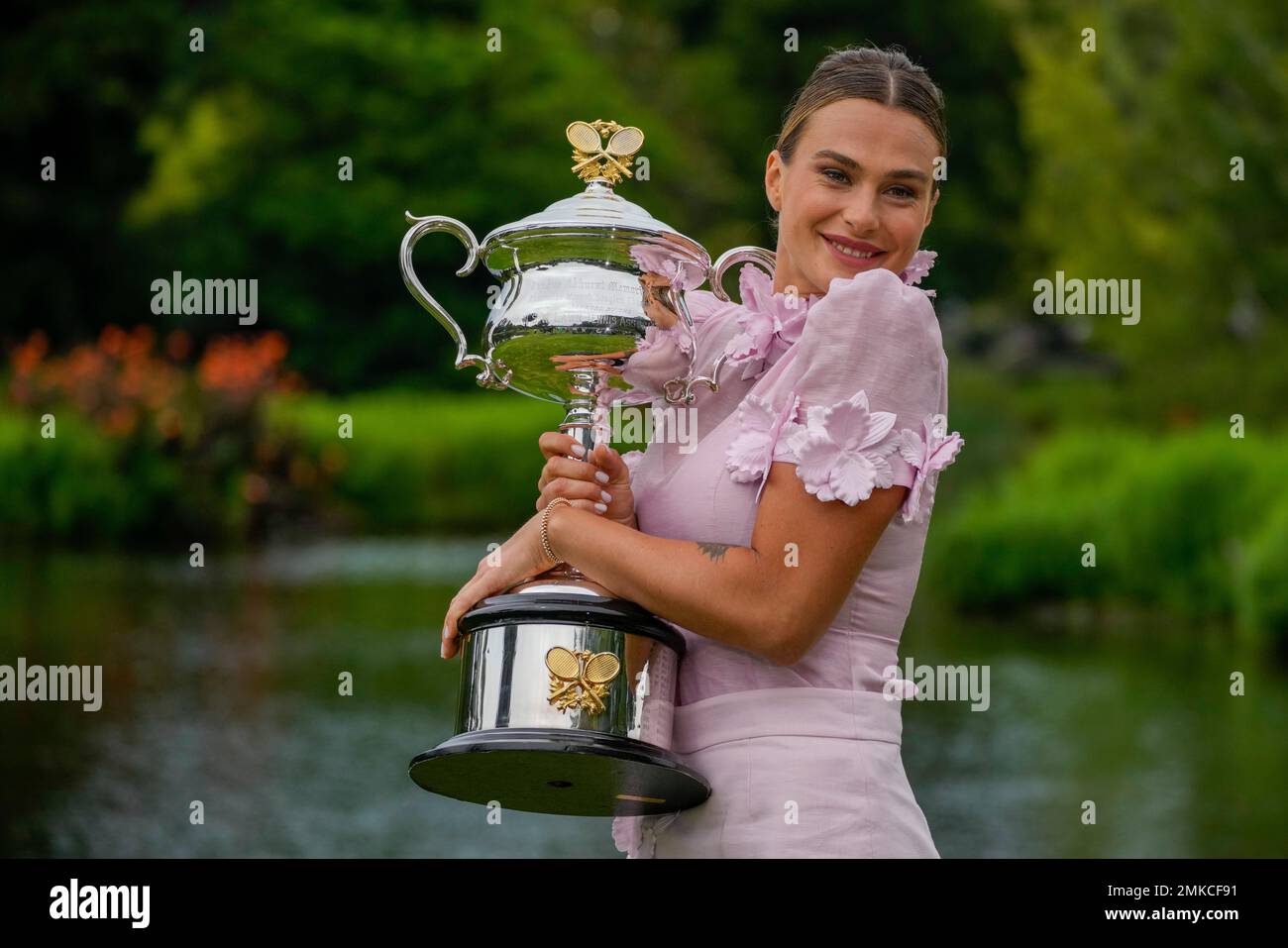 Aryna Sabalenka of Belarus poses with the Daphne Akhurst Memorial Trophy in the Royal Botanical ...