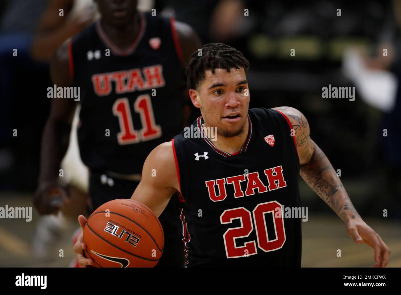 Utah Utes forward Timmy Allen (20) in the first half of an NCAA college ...