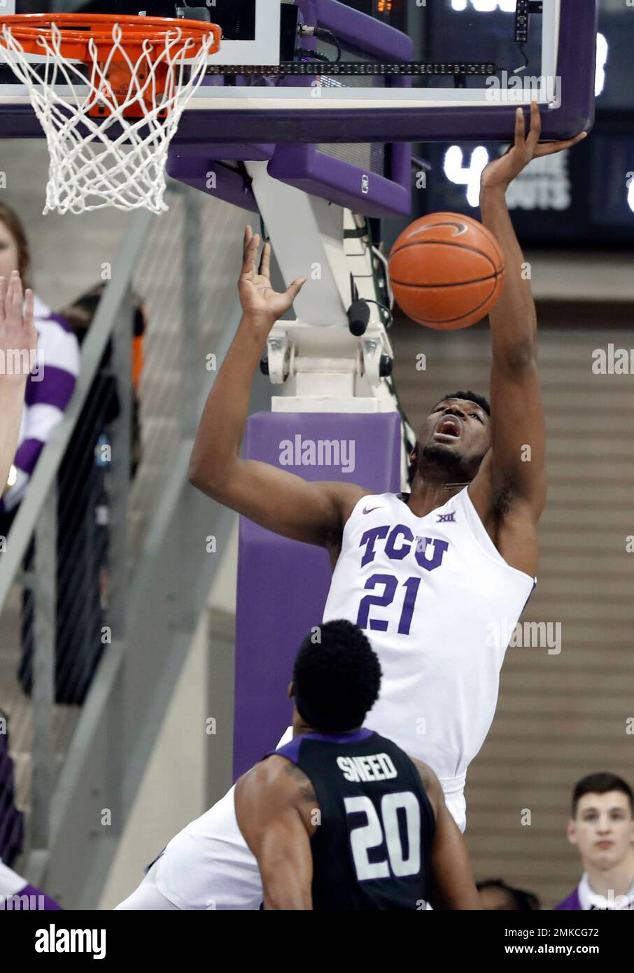 TCU center Kevin Samuel (21) loses control of the ball while shooting ...