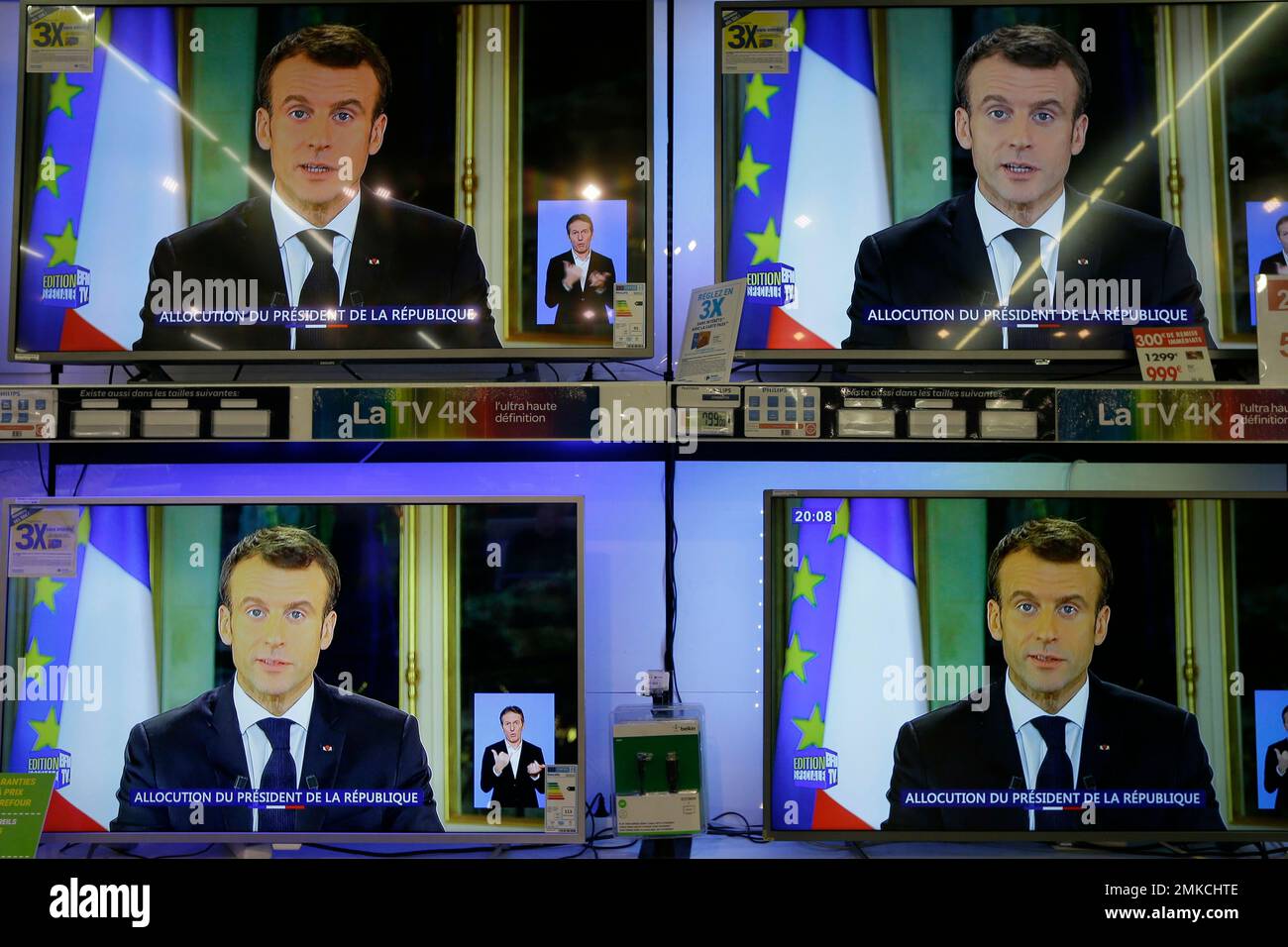 FILE - In this Monday, Dec. 10, 2018 file photo TV screens show French ...