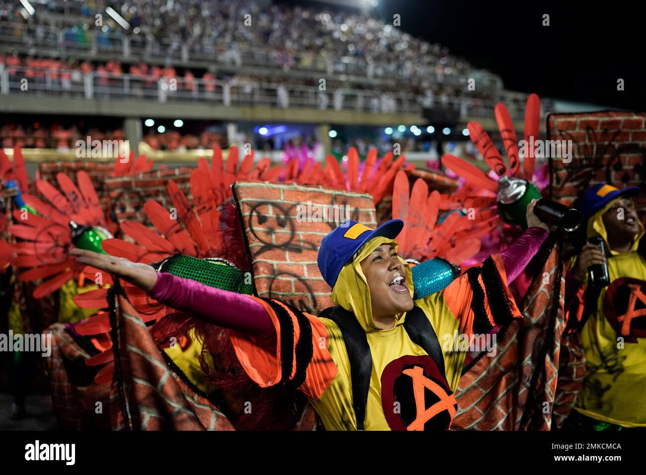 A performer from the Academicos do Grande Rio samba school parades ...