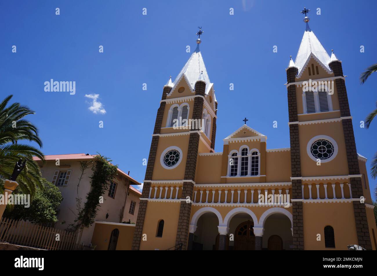 A German inspired church with a tall steeple and window details Stock ...