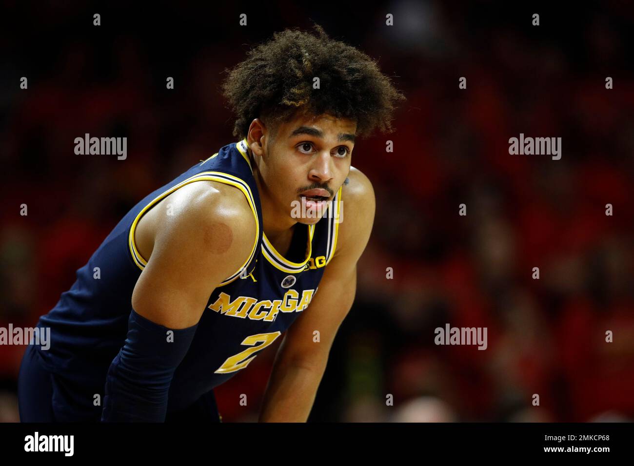 Michigan guard Jordan Poole stands on the court in the second half of ...