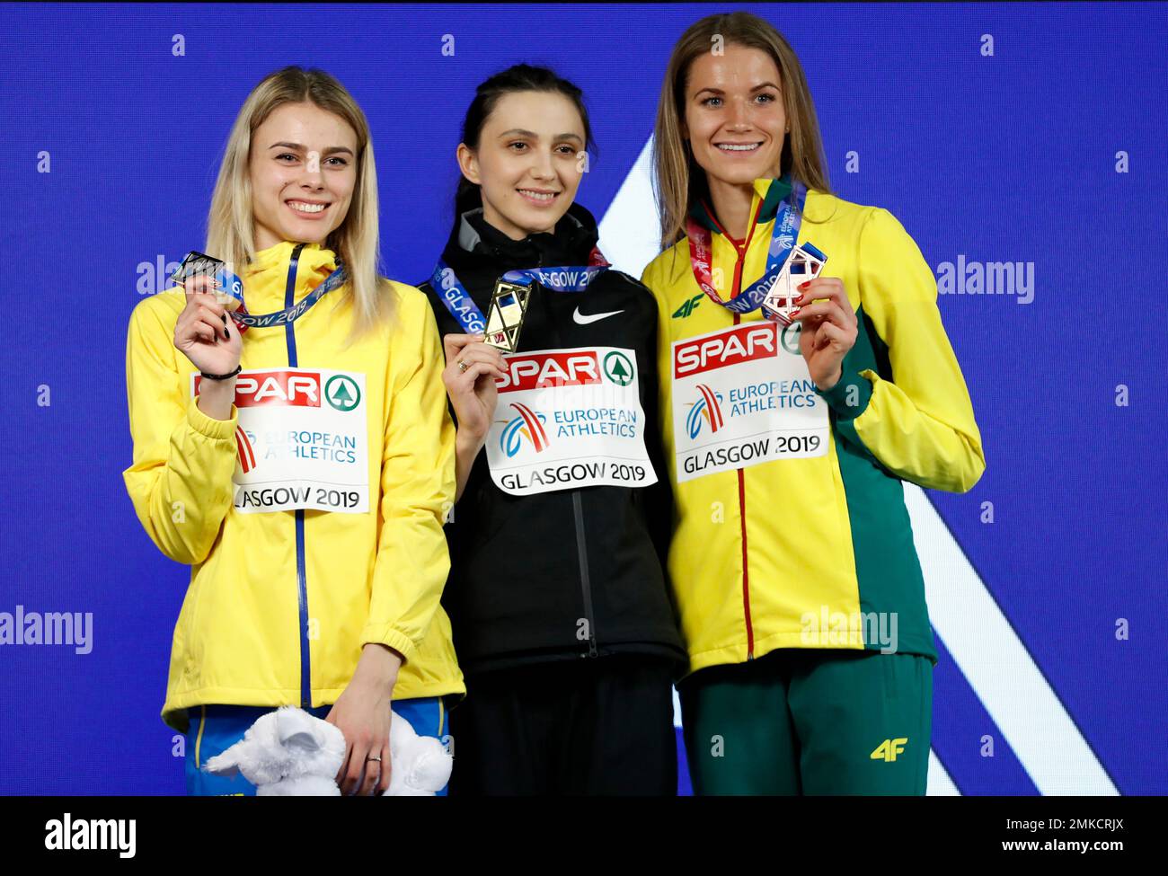 Silver medalist Yuliya Levchenko of Ukraine, gold medalist Mariya Lasitskene of Russia and ...